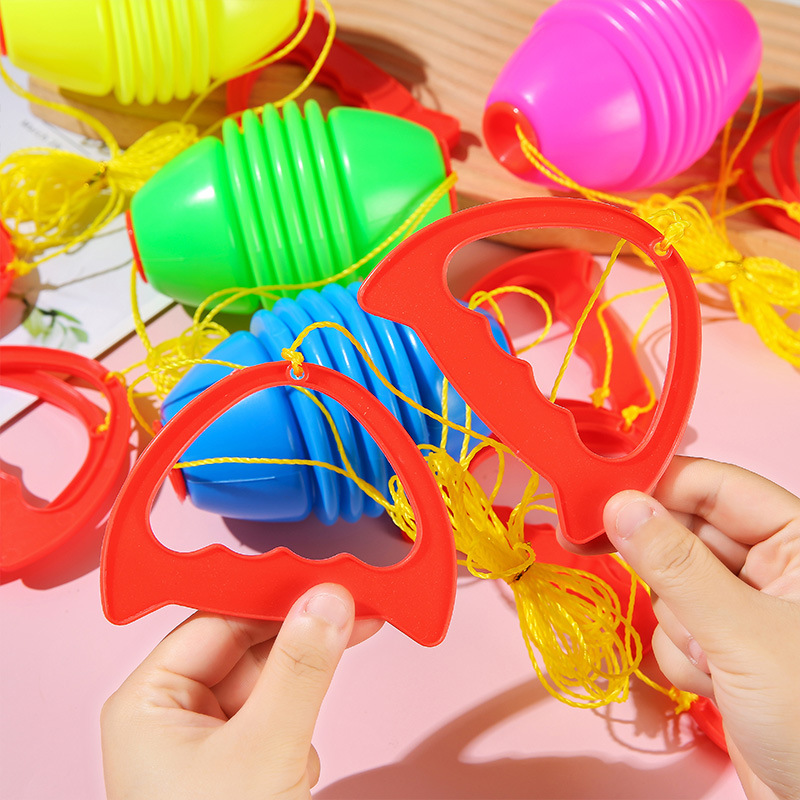 Pull ball, children's elastic shuttle, hand pull ball, kindergarten ...